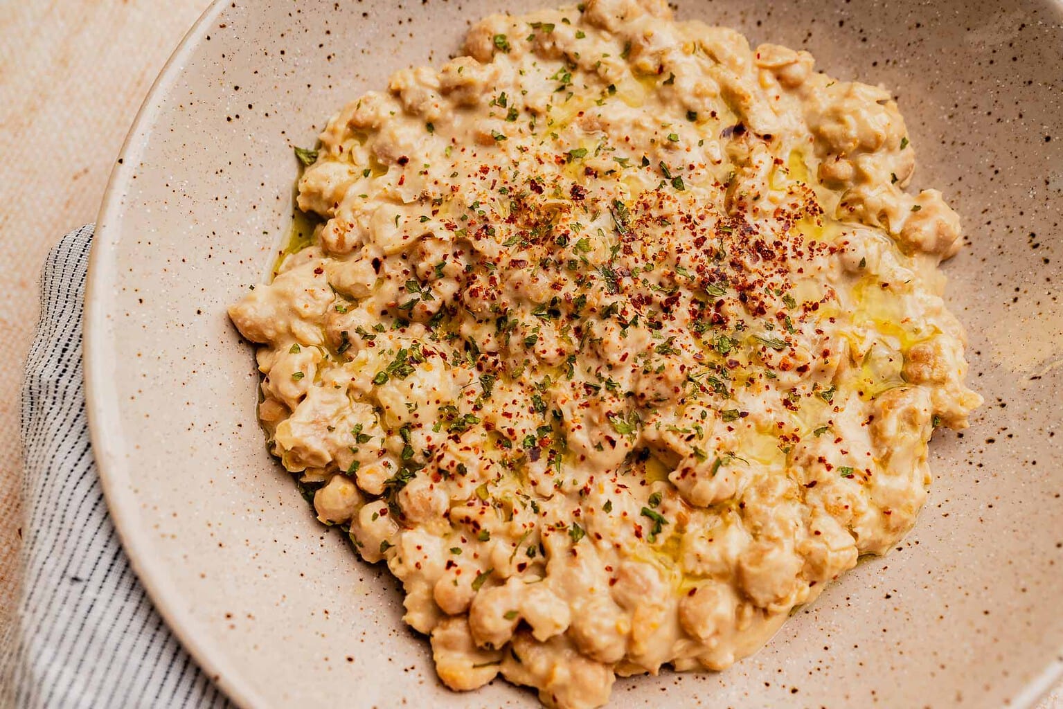 Musabaha Recipe (Warm Chickpeas With Tahini and Lemon)